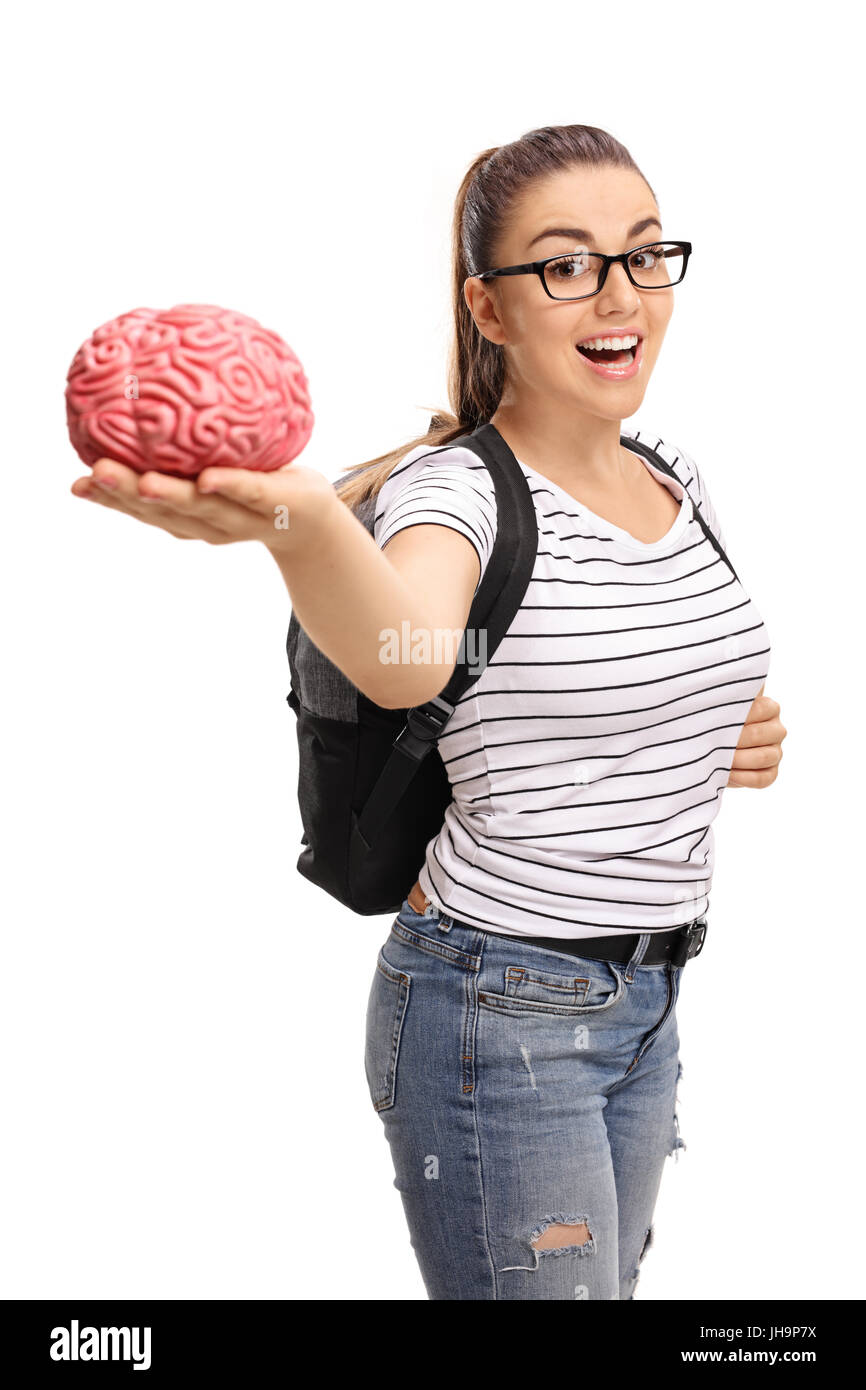 Teenage student holding a brain model isolated on white background ...