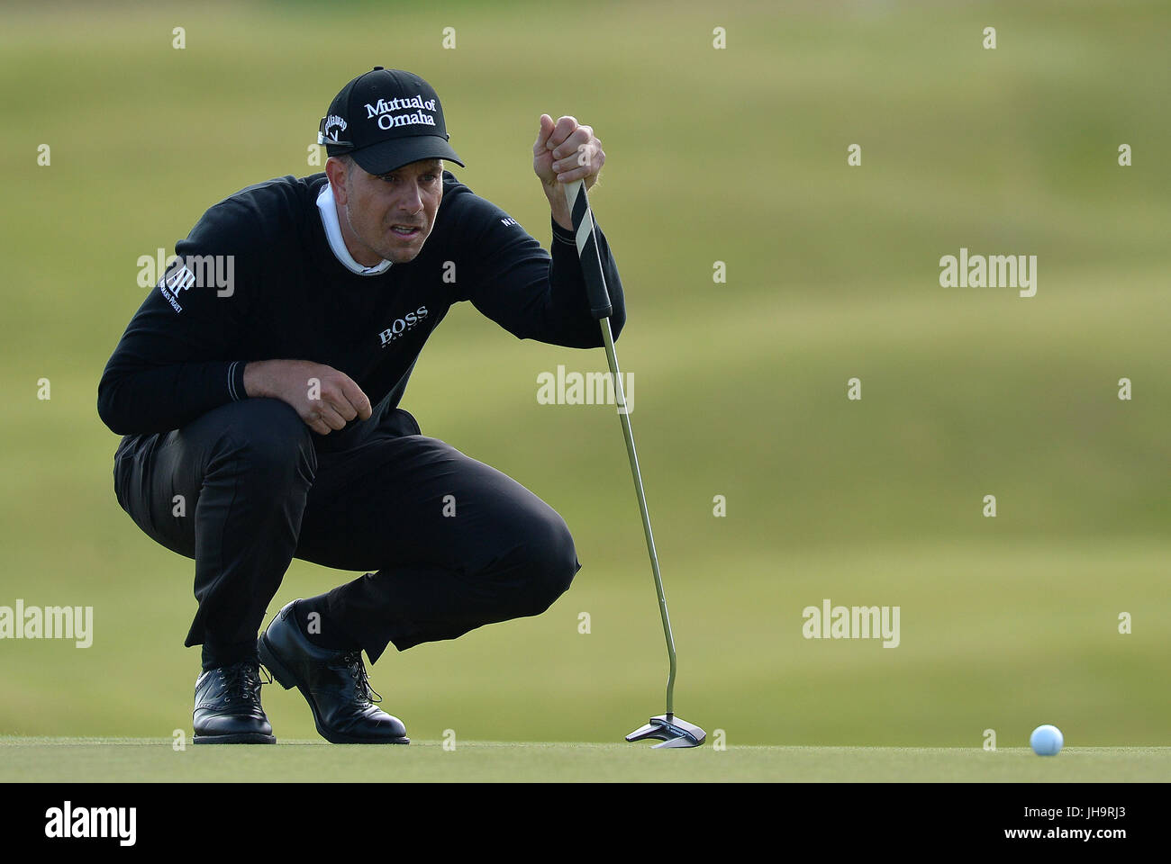 Henrick Stenson of Sweden looks over his putt at the 5th hole during ...