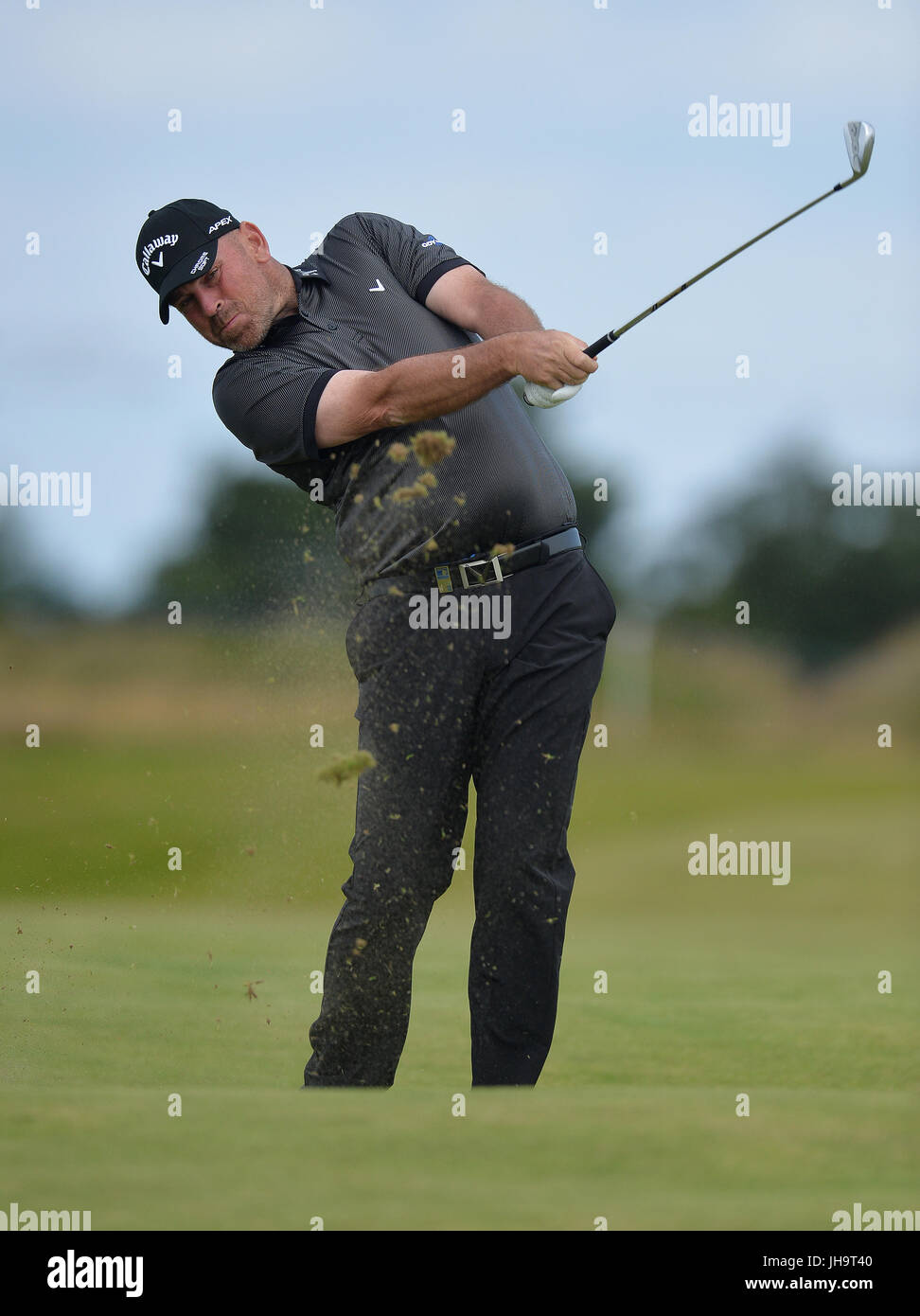 Denmark's Thomas Bjorn plays his second shot at the 8th hole during day ...
