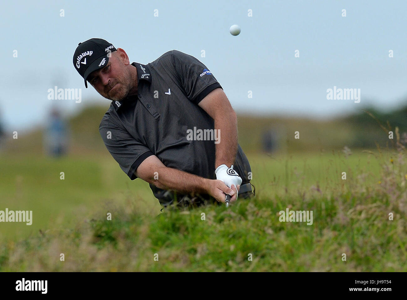 Denmark's Thomas Bjorn plays his third shot at the 9th hole during day ...