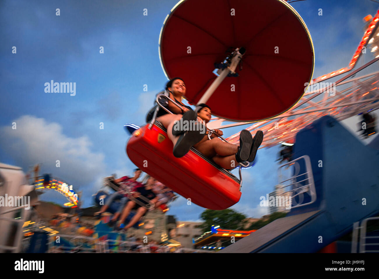 Child spinning wheel park hi-res stock photography and images - Alamy