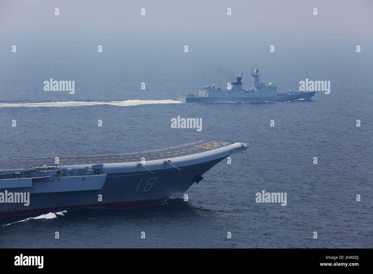 Aboard Liaoning Aircraft Carrier. 13th July, 2017. A flotilla including ...