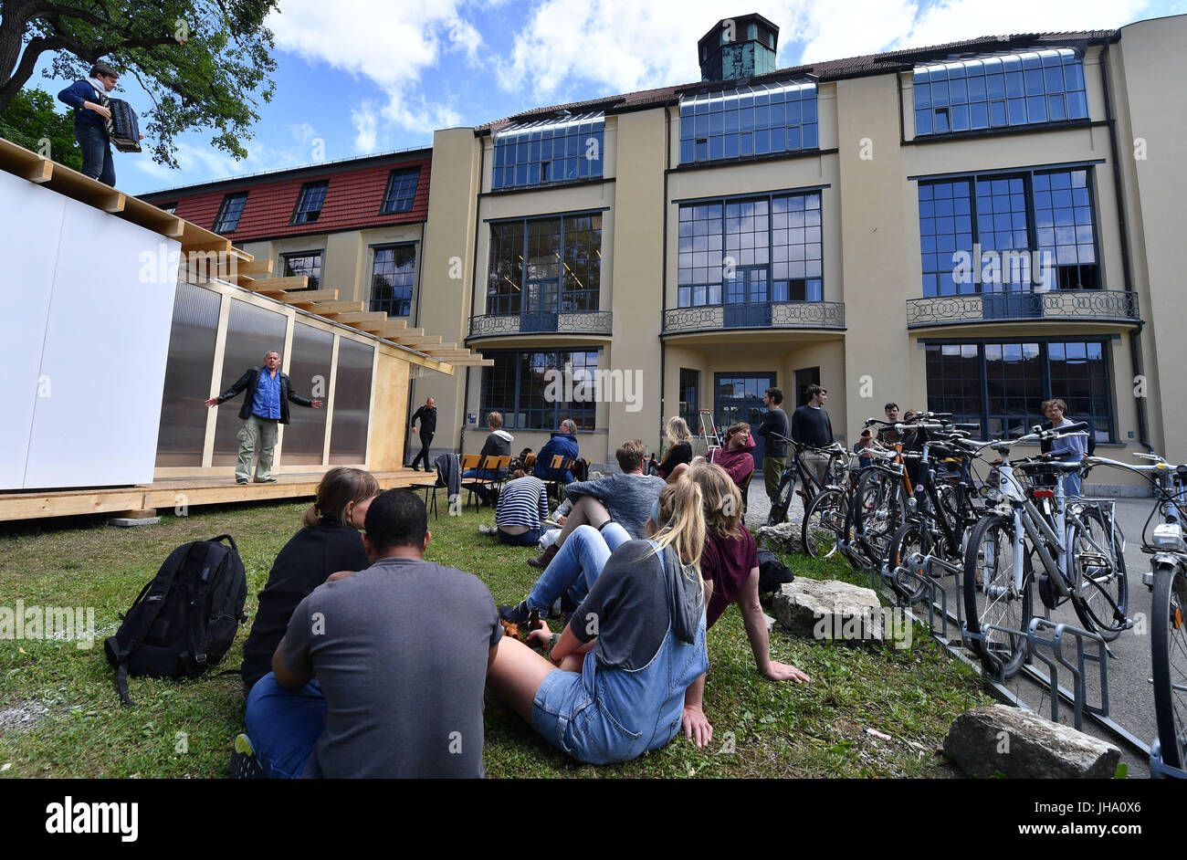 Weimar, Germany. 13th July, 2017. Students of the Bauhaus University Weimar sit in front of the ...