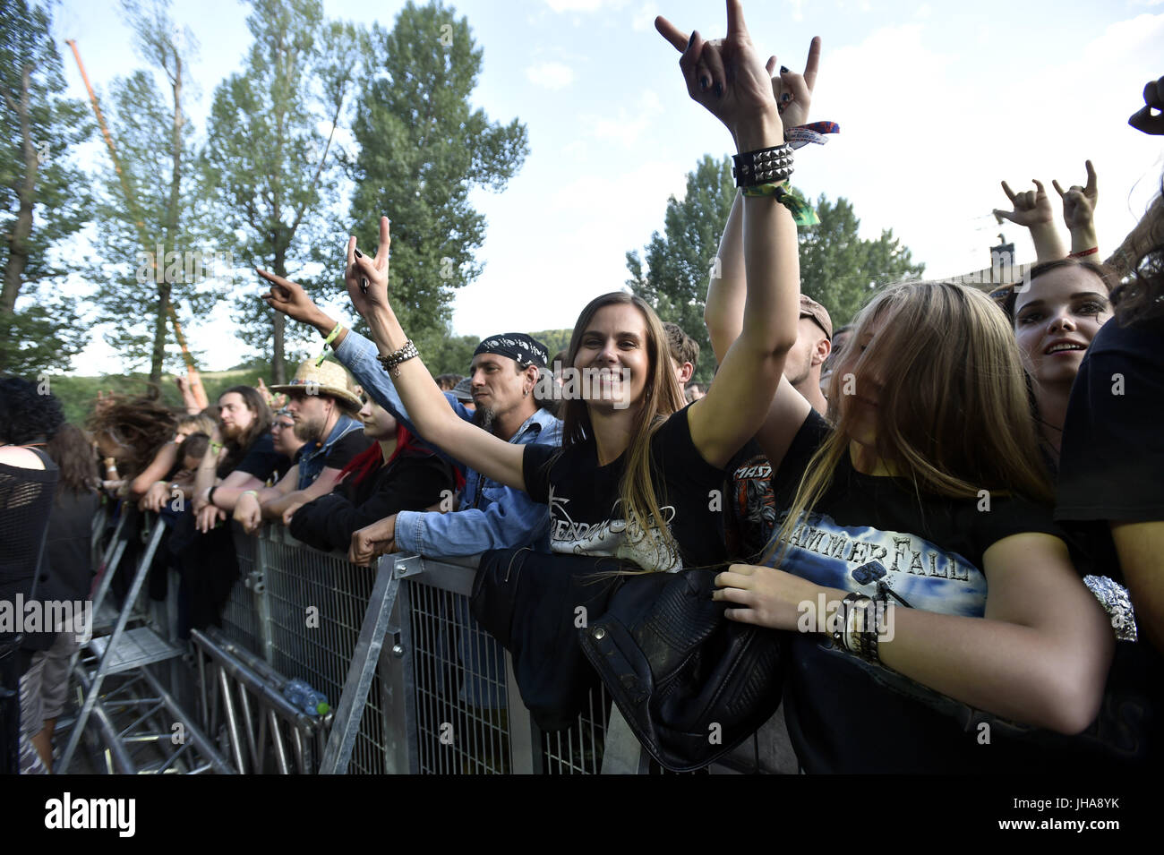 Music fans attend the opening day of the music festival Masters of Rock ...