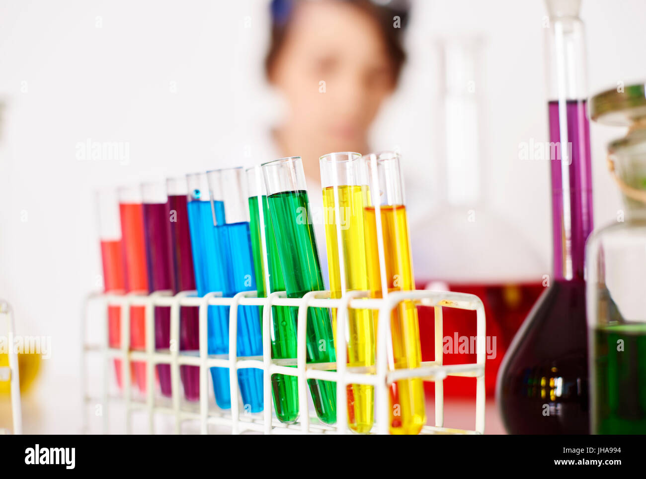 Multi colored liquid in laboratory glassware Stock Photo - Alamy