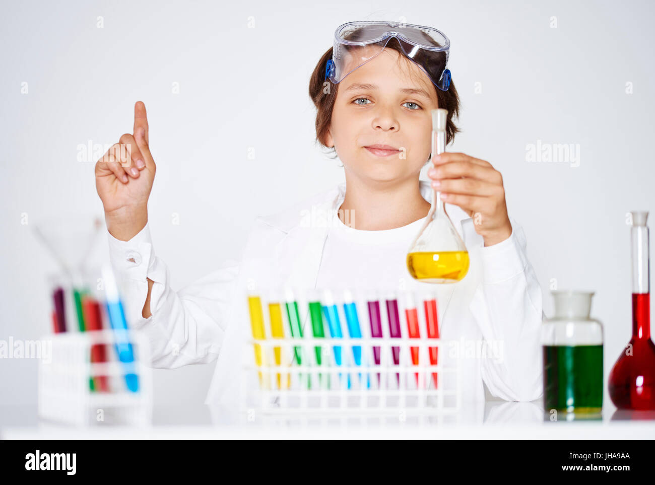 Cute scientist has great idea Stock Photo - Alamy