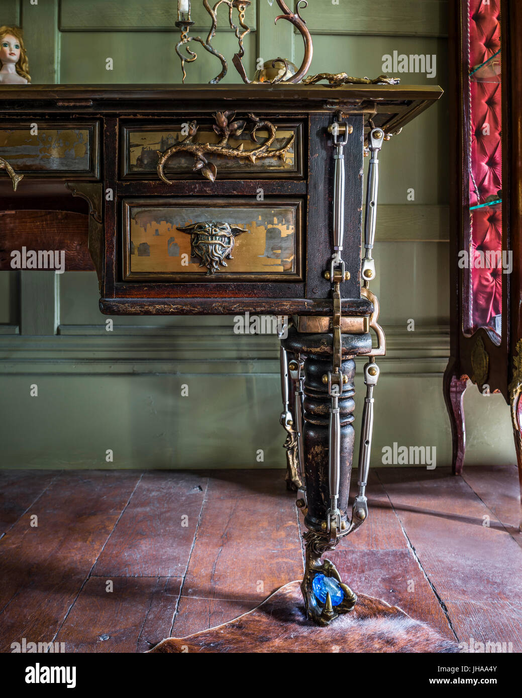 Quirky desk with clawed foot Stock Photo - Alamy