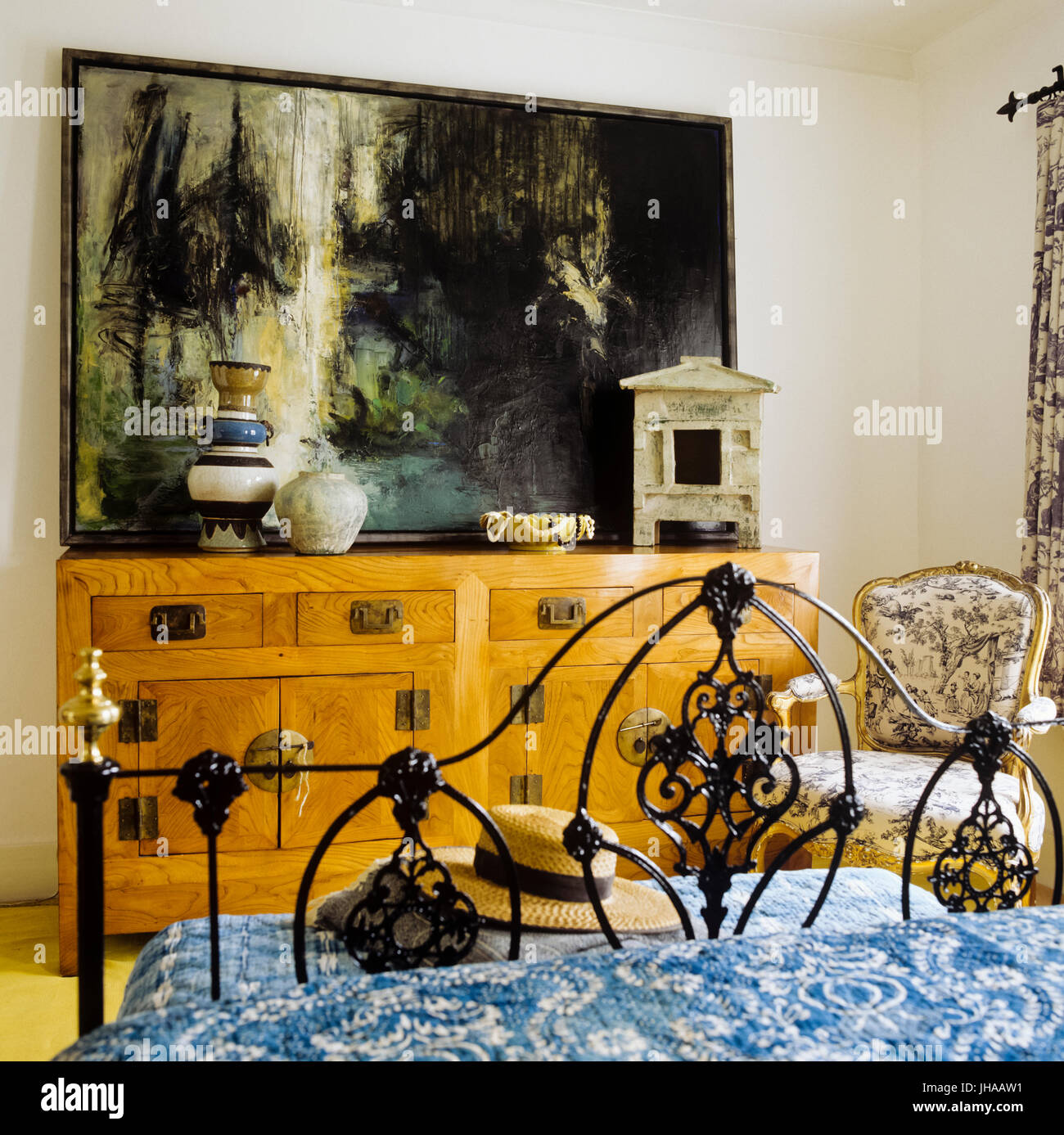 Painting on drawers in bedroom Stock Photo - Alamy