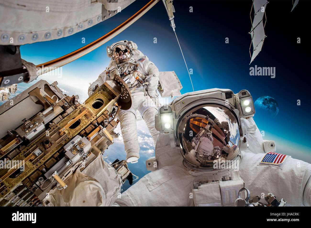 International Space Station and astronaut in outer space over the ...