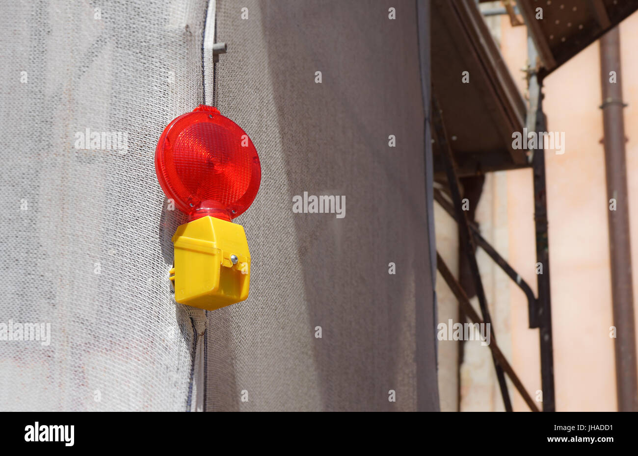 Barricade and Warning Light Closeup . Red street light for work Stock ...