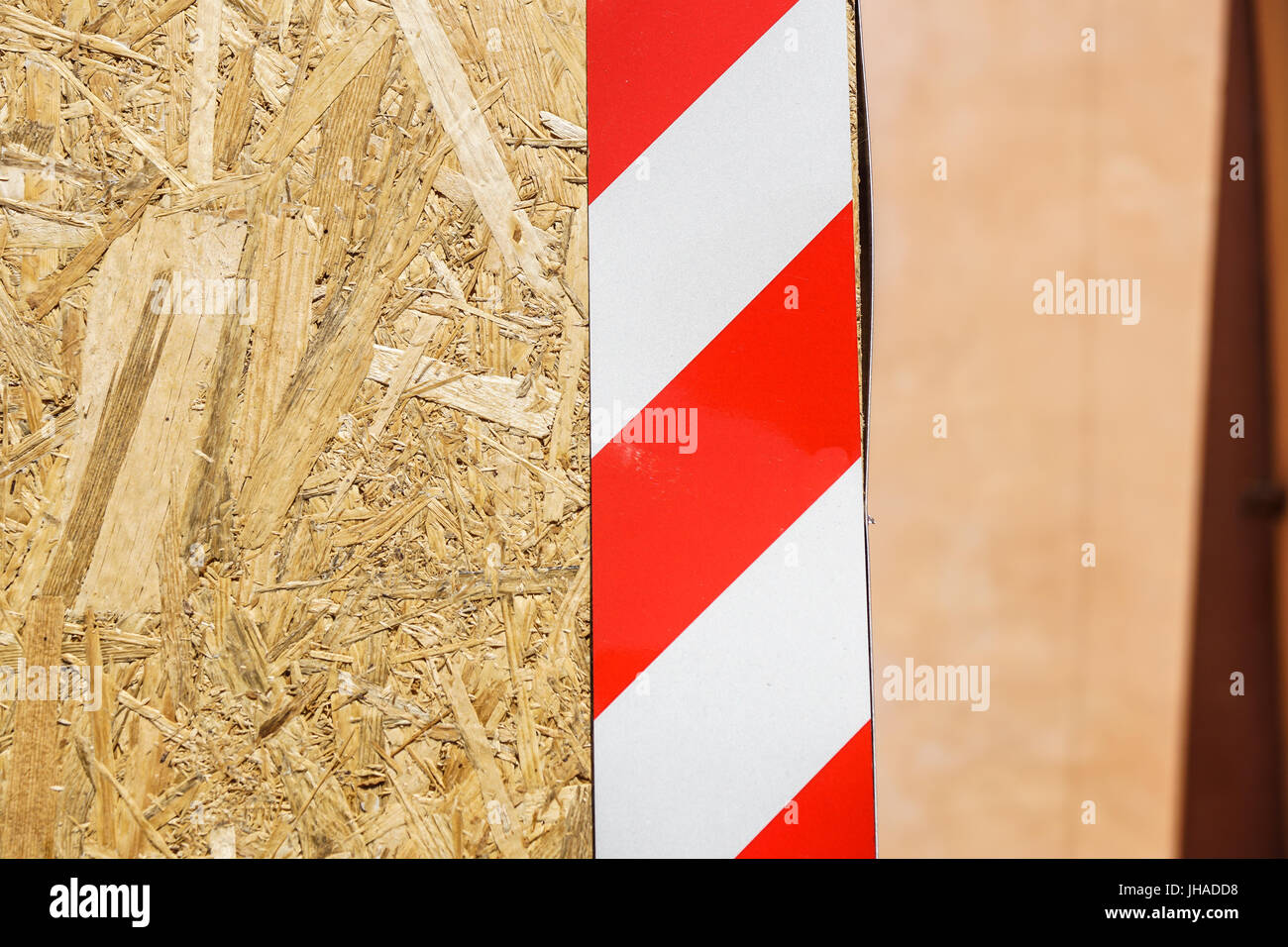 Danger Sign on Wooden Fence Stock Photo - Alamy