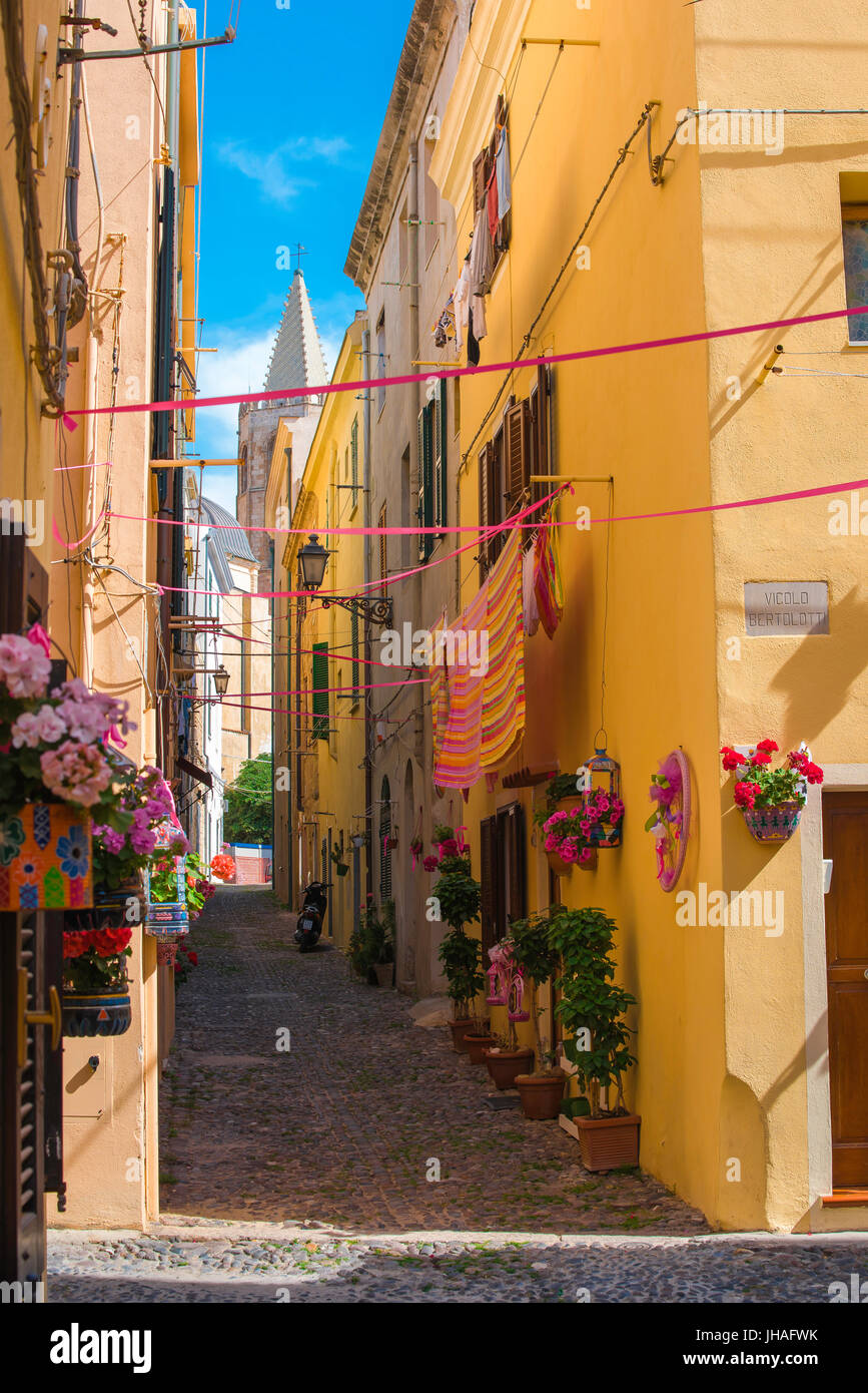 Sardinia coast, a colourful street in the historic old town quarter of ...