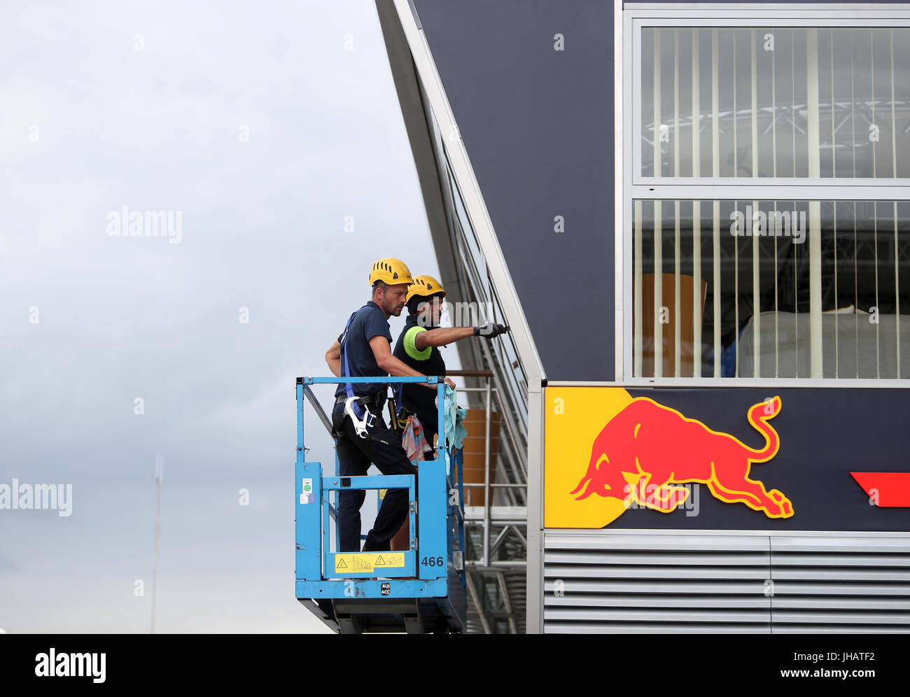 Workers prepare the Red Bull Racing trailer during Paddock Day of the ...