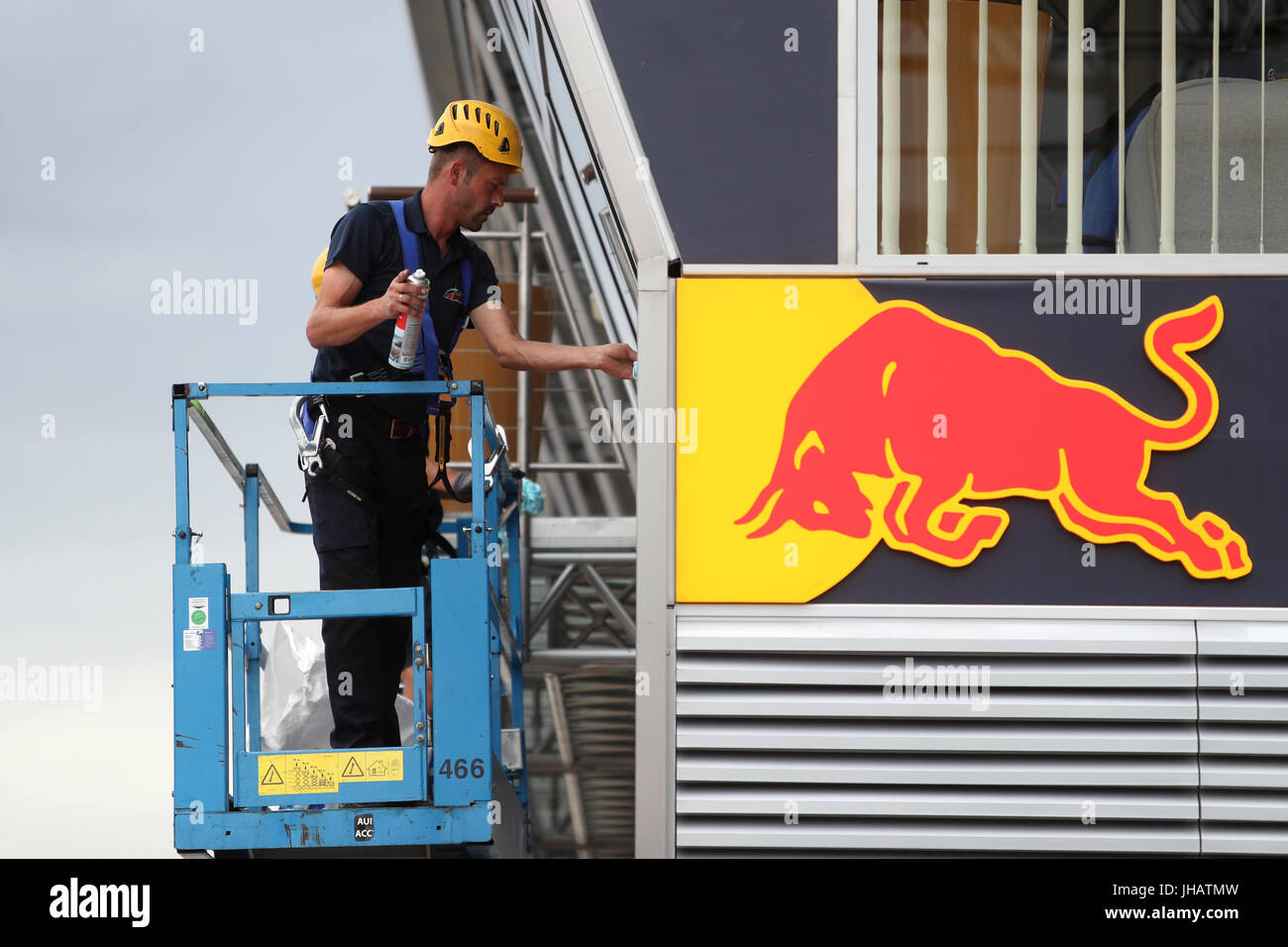 Workers prepare the Red Bull Racing trailer during Paddock Day of the ...