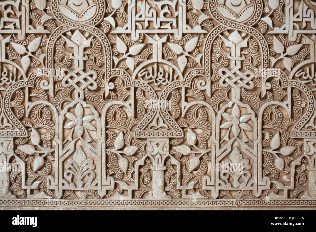 Arabesque wall decoration in the Patio of the Lions (Patio de los ...
