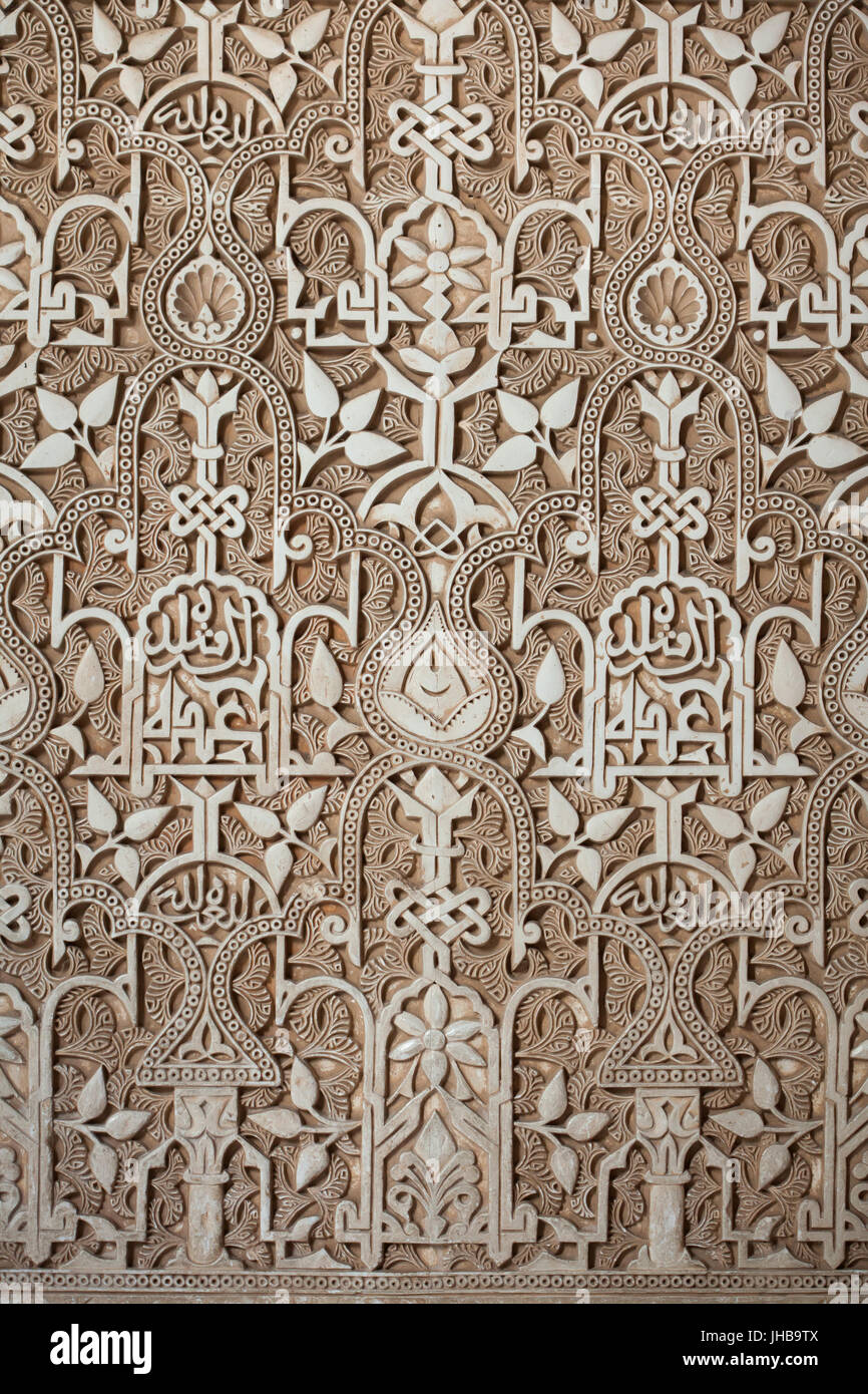 Arabesque wall decoration in the Patio of the Lions (Patio de los ...