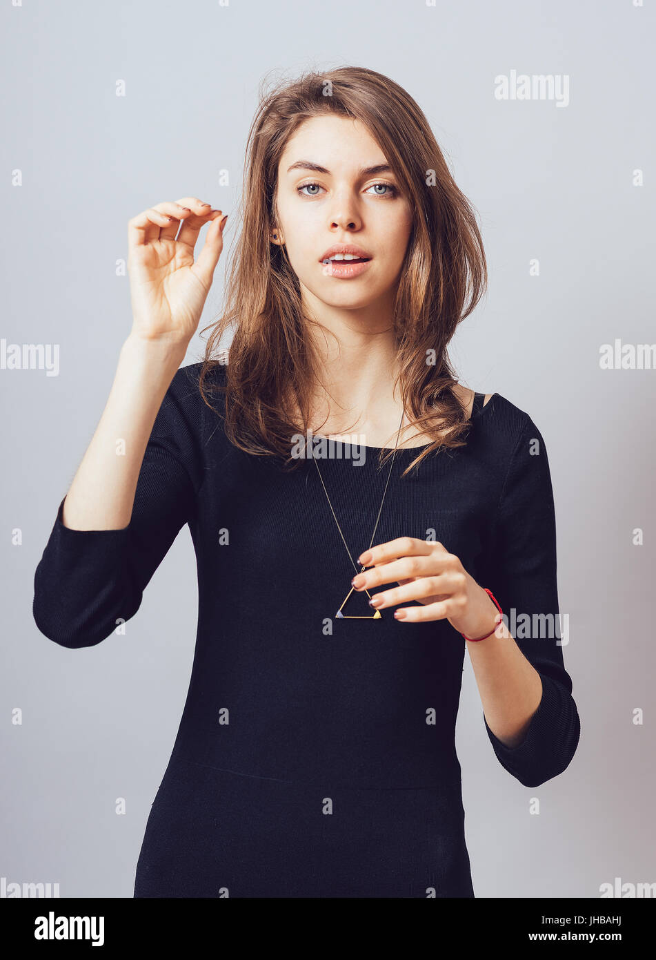 female gesture conductor Stock Photo - Alamy