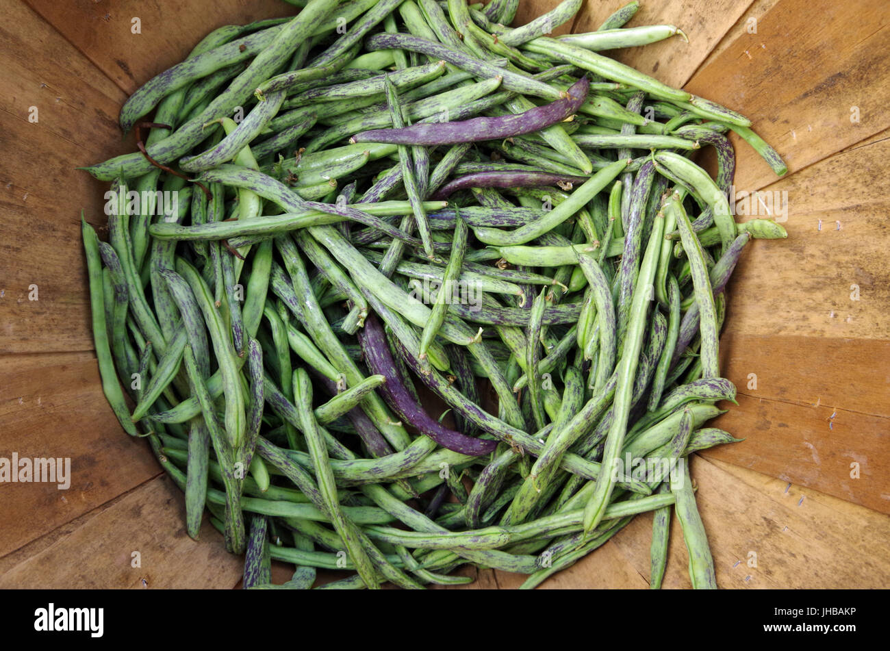 Dragon tongue beans in wooden basket viewed from above Stock Photo - Alamy