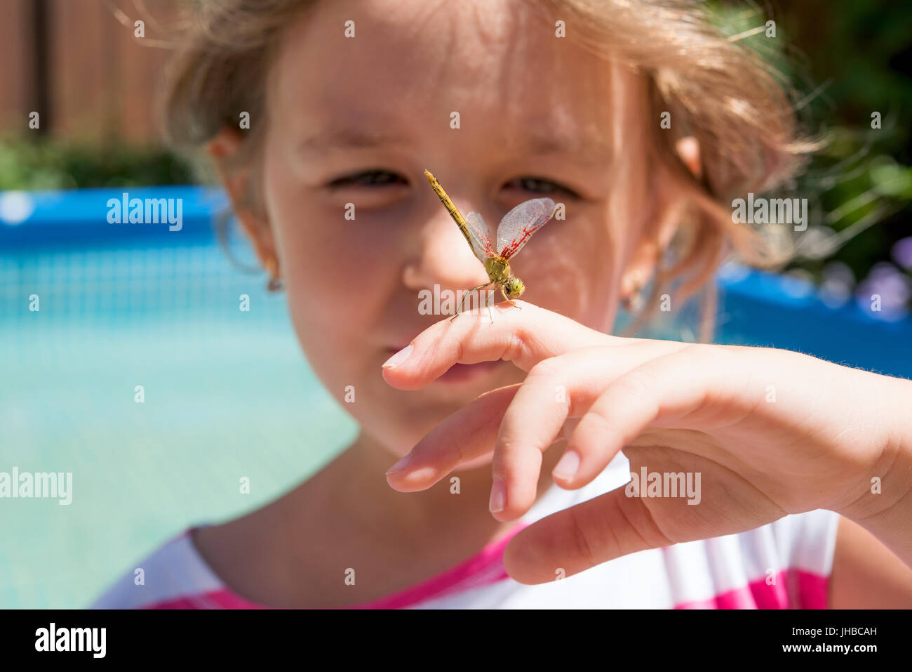 baby with dragonfly Stock Photo - Alamy