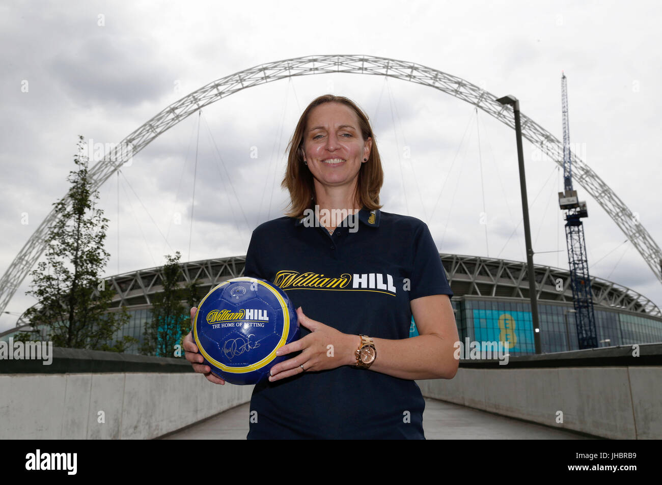 Former England footballer Faye White poses for a picture during a ...