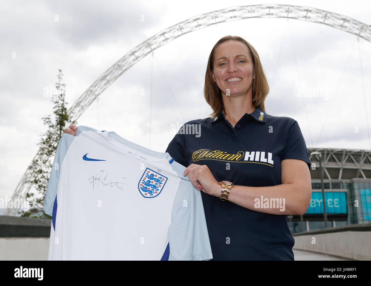 Former England footballer Faye White poses for a picture during a ...