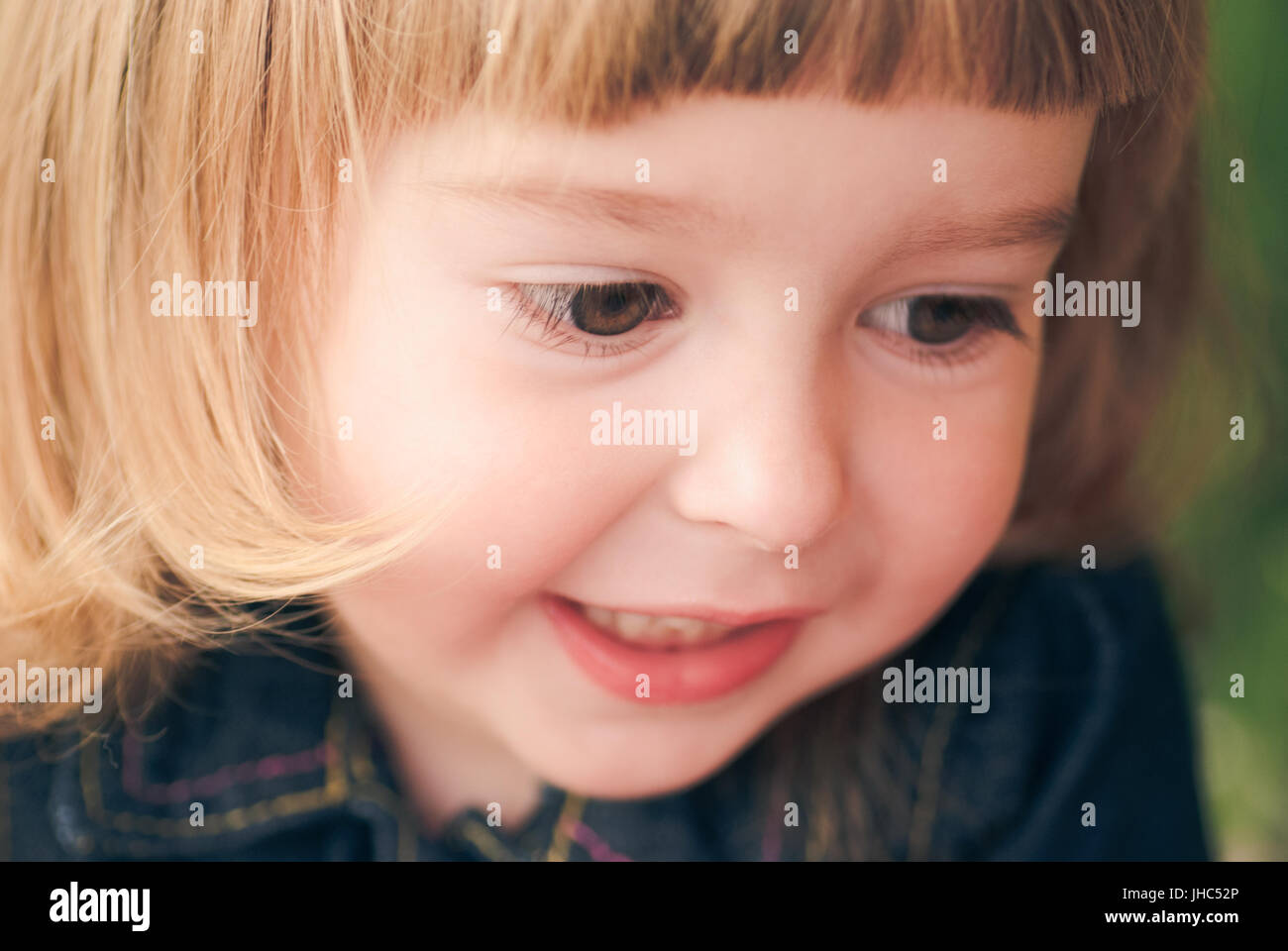 Close up soft portrait of litle girl outdoor Stock Photo - Alamy