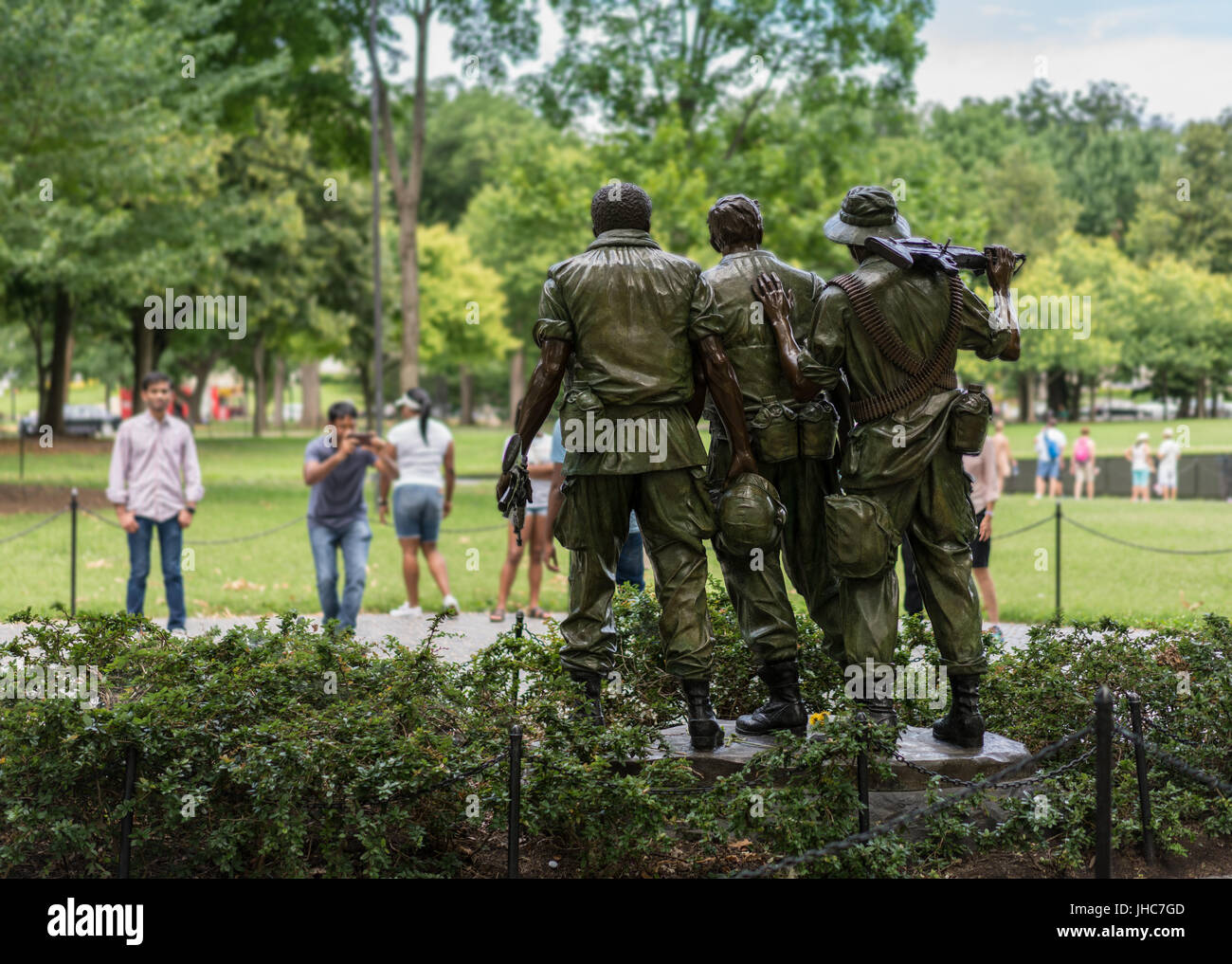 Tourists taking photos of Three Soldiers statue in DC Stock Photo - Alamy