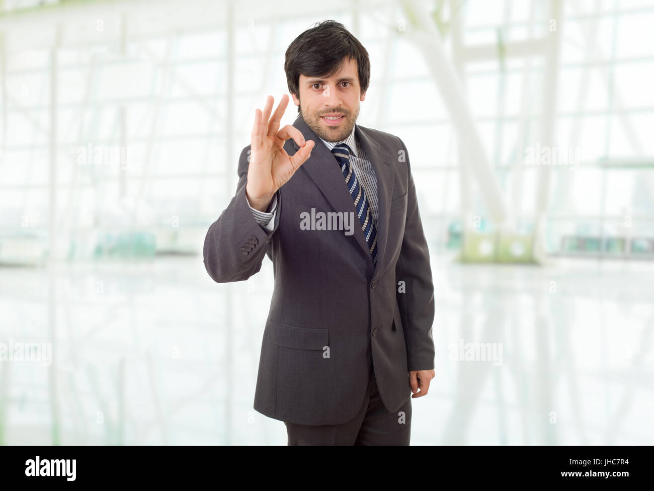 happy business man winning, at the office Stock Photo - Alamy