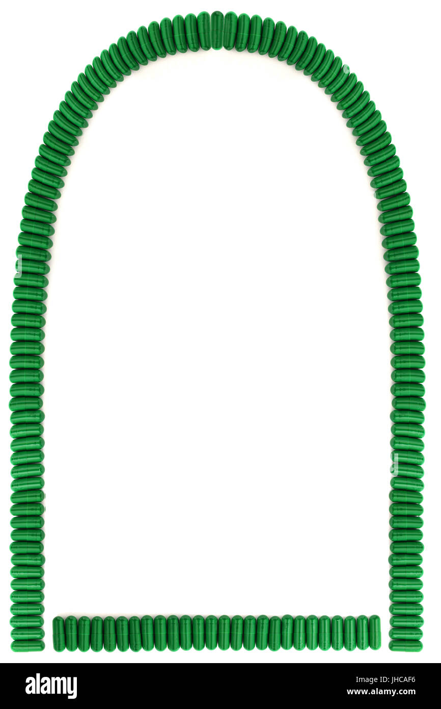 Frame from green capsules isolated on white background Stock Photo - Alamy