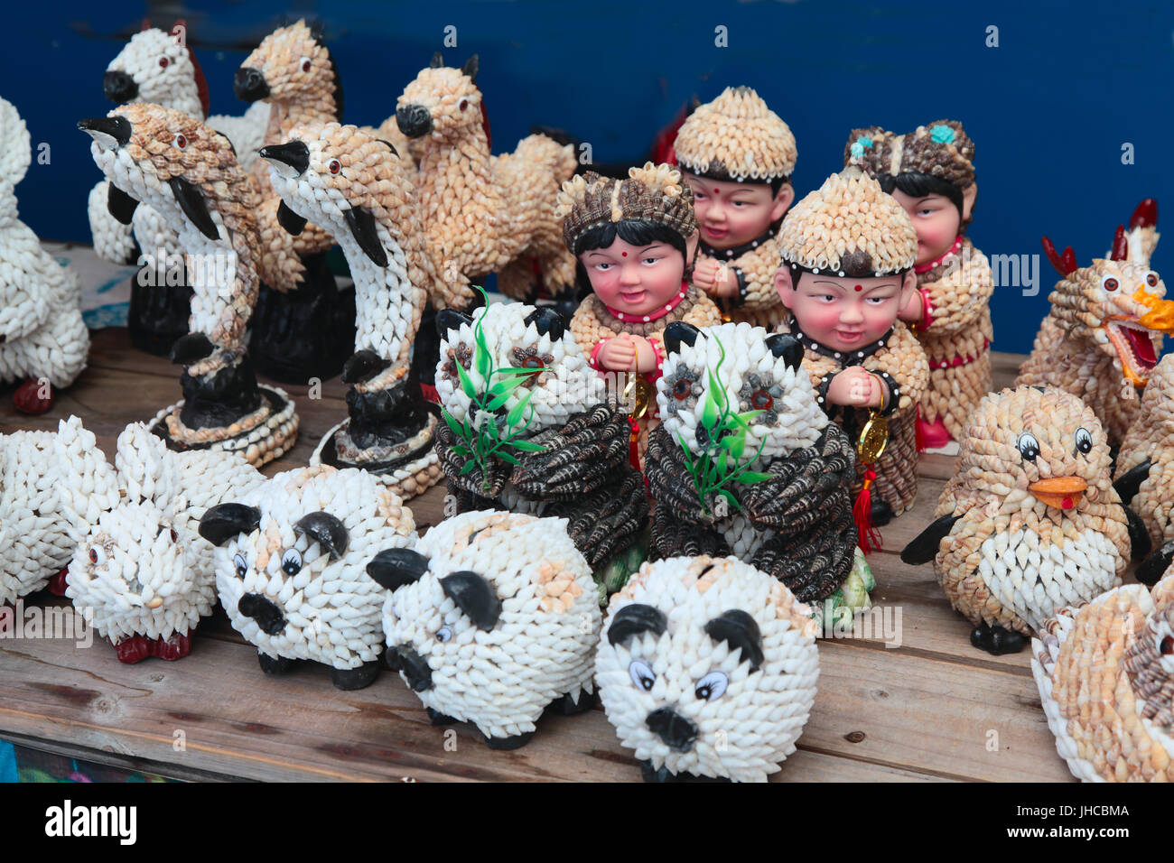 Seashell souvenir hand-made in a showcase Stock Photo - Alamy