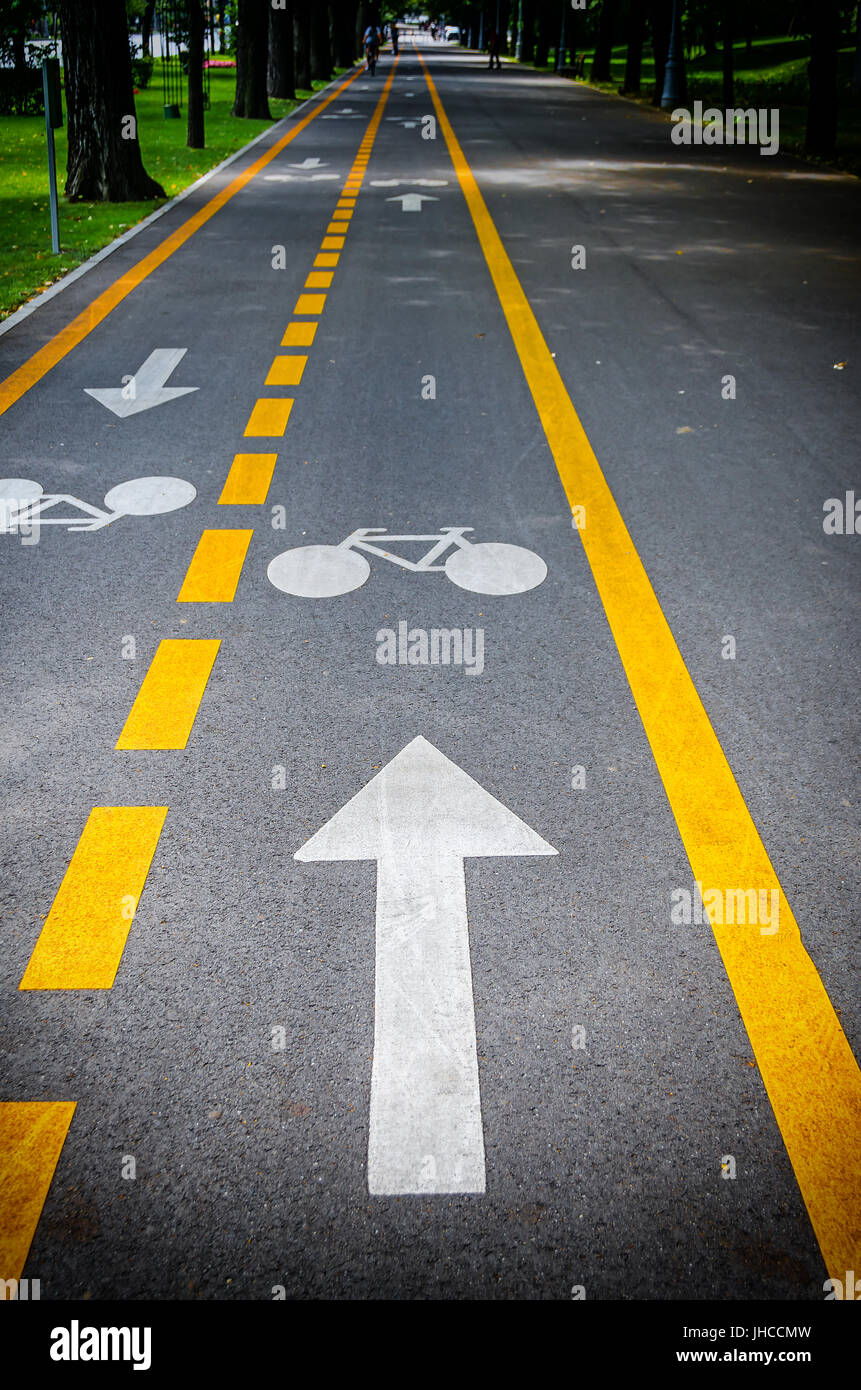 Arrow pointing a bike on a bicycle track Stock Photo - Alamy