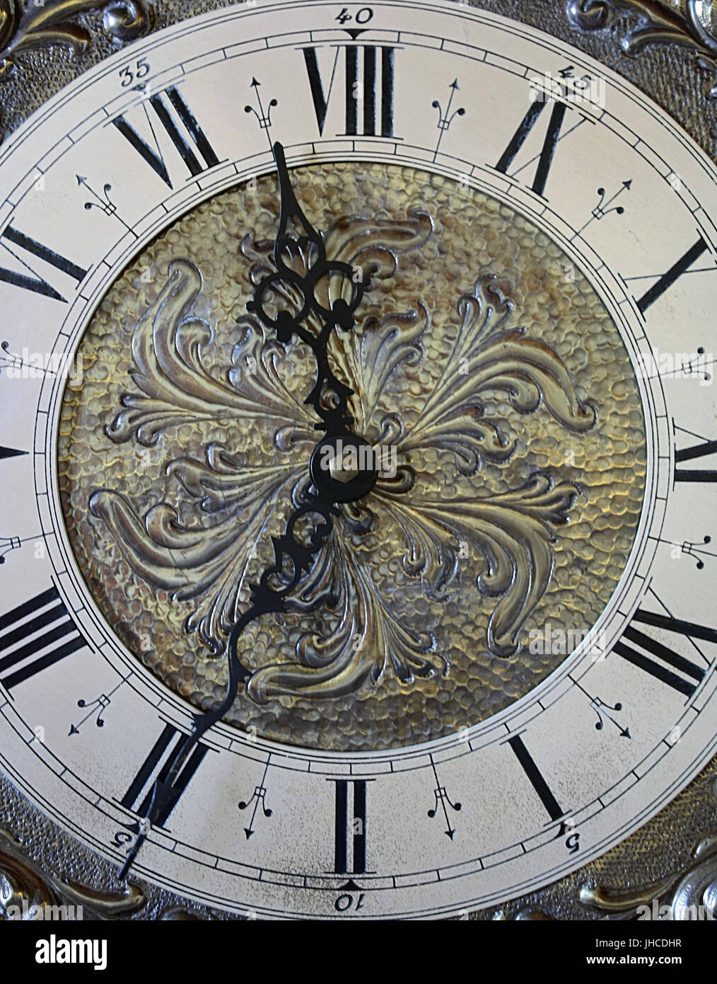 Close-up picture dial pendulum clock Stock Photo - Alamy