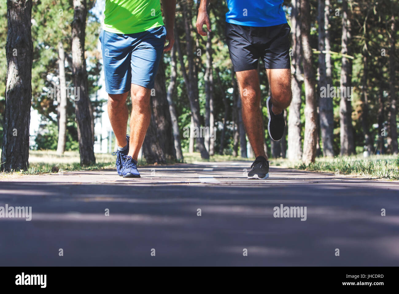 Happy men outside running hi-res stock photography and images - Alamy