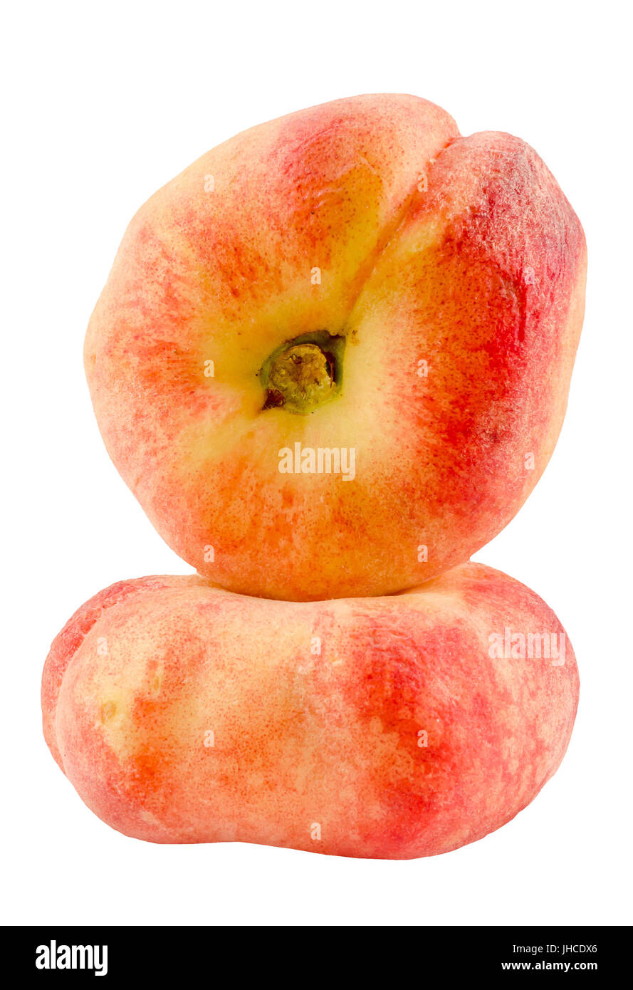 Saturn peaches, also known as Donut (Doughnut) peaches, are a variety ...