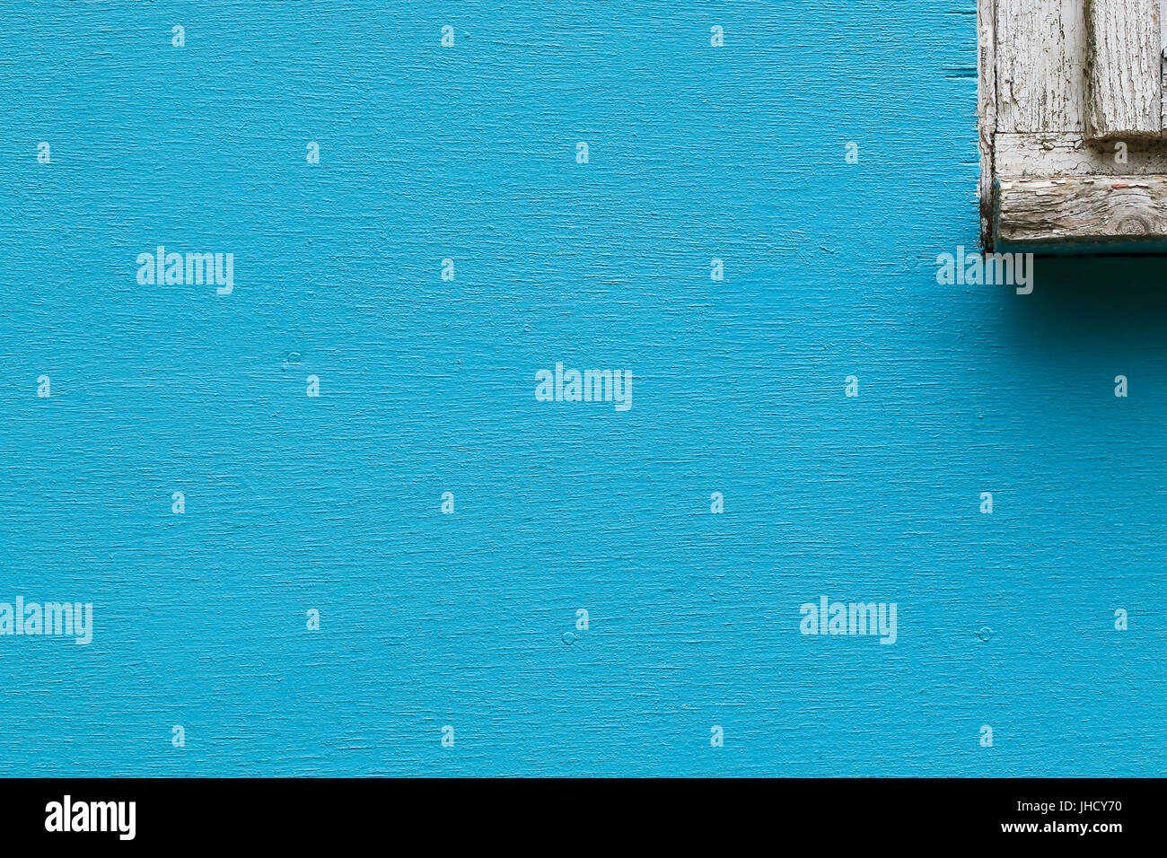Vibrant blue painted panel with aged window edge Stock Photo - Alamy