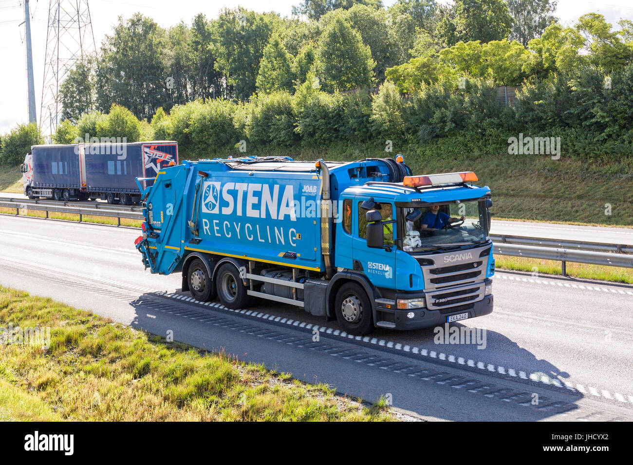 Blue Stena Recycling garbage truck / waste truck / dustcart driving on ...