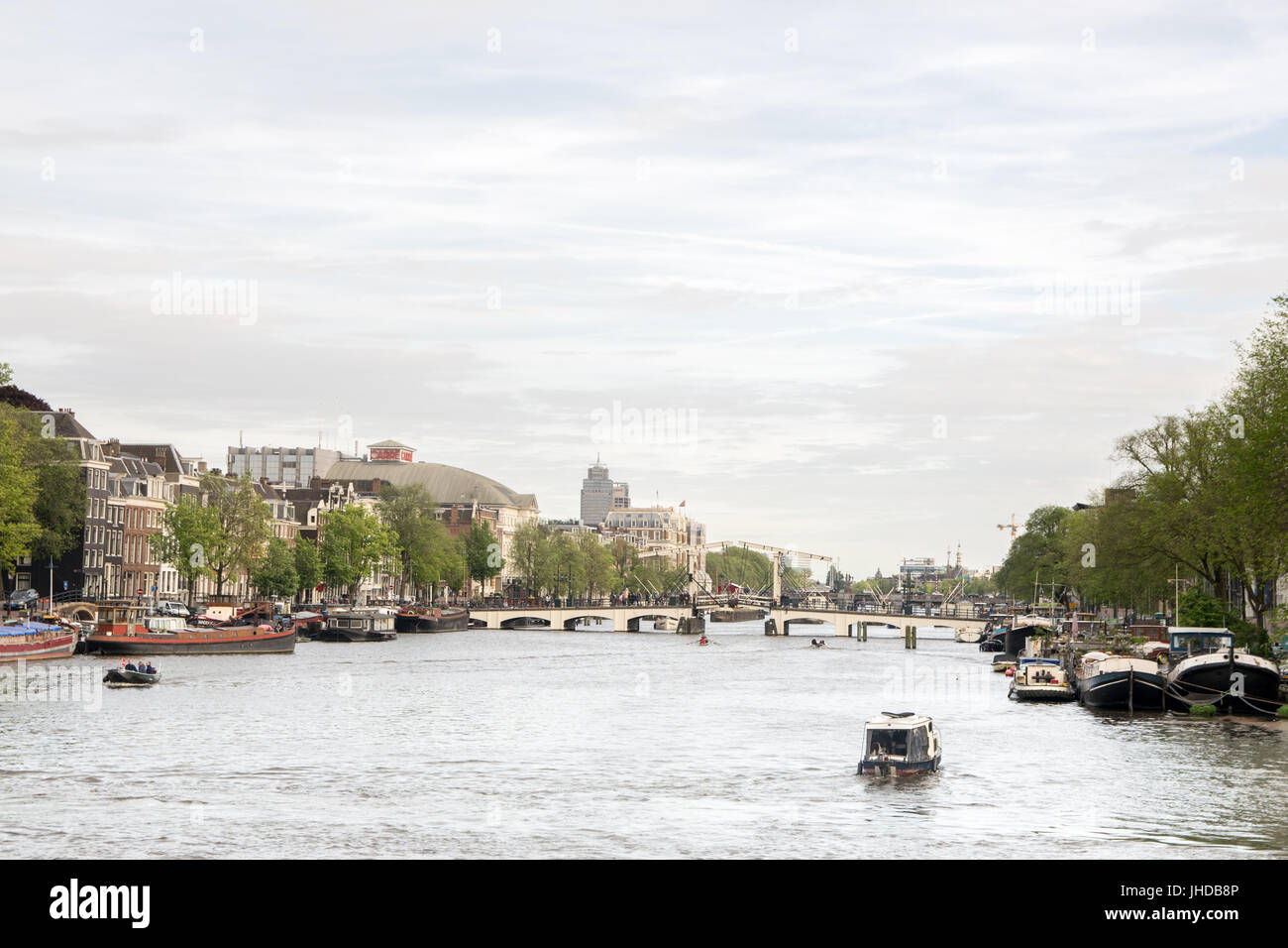 Canals of Amsterdam. Amsterdam is the capital and most populous city of the Netherlands Stock ...