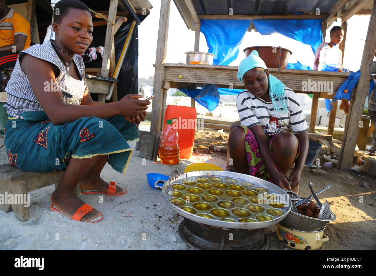 Ivory-Coast road venders Stock Photo - Alamy