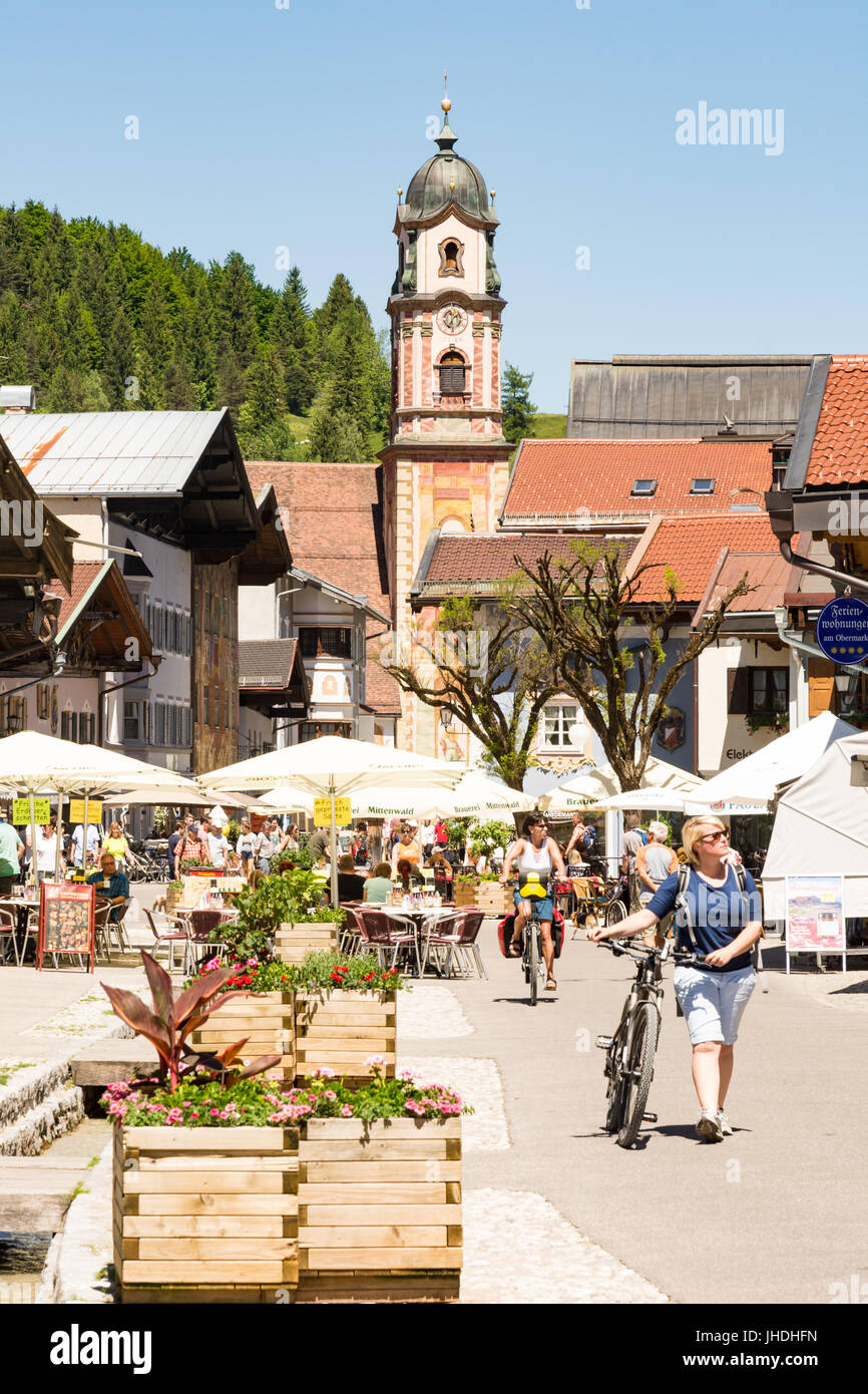 MITTENWALD, GERMANY - MAY 27: Tourists at the historic old town of ...