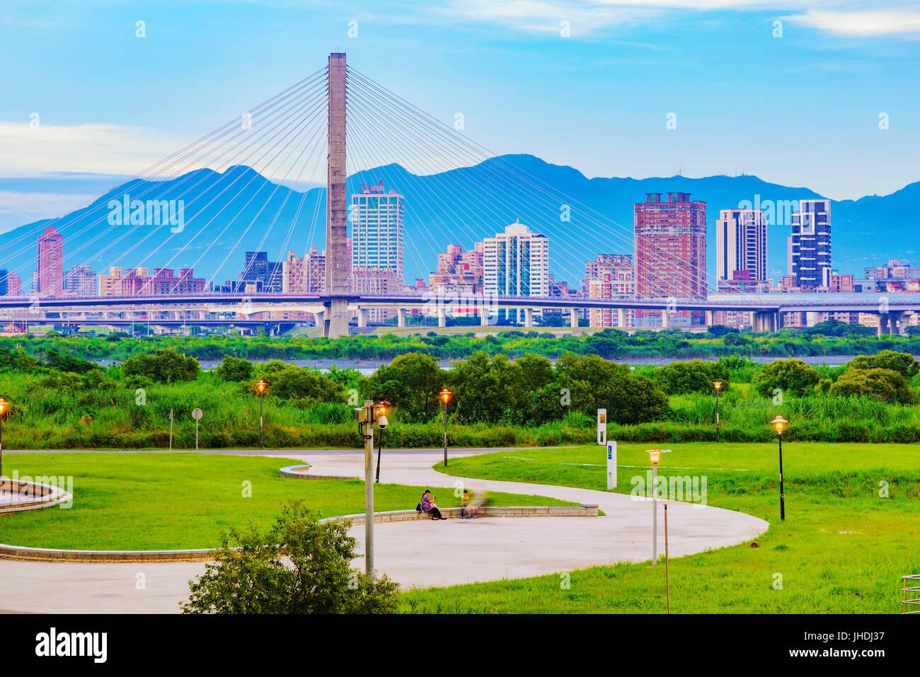 Taipei riverside park and city view in the evening Stock Photo - Alamy