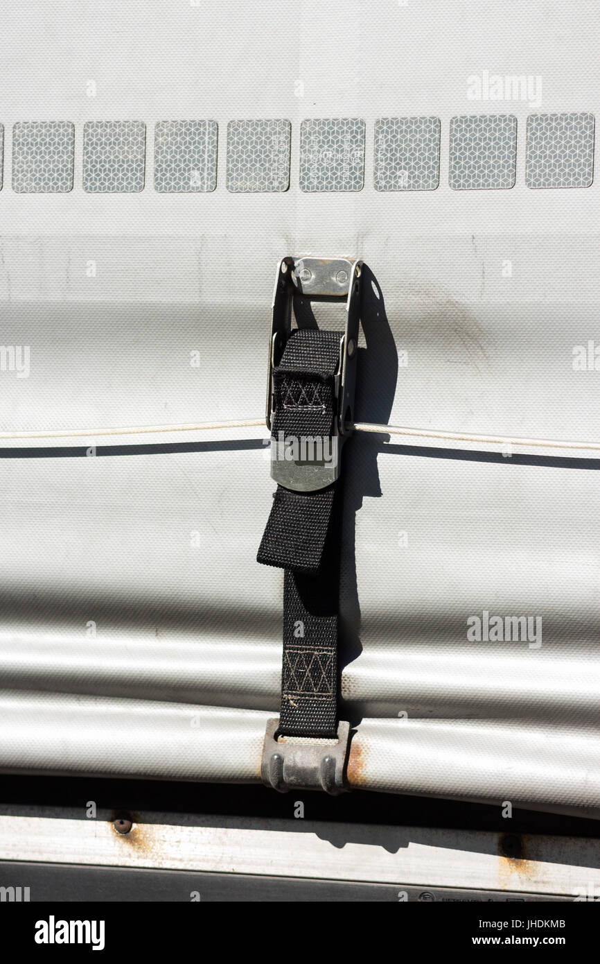 black metal ratchet to secure the load of a truck Stock Photo - Alamy