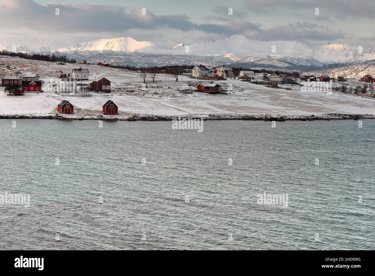 Houses on Holdoya-island E.shore seen from Ringen hamlet on Austvagoya ...