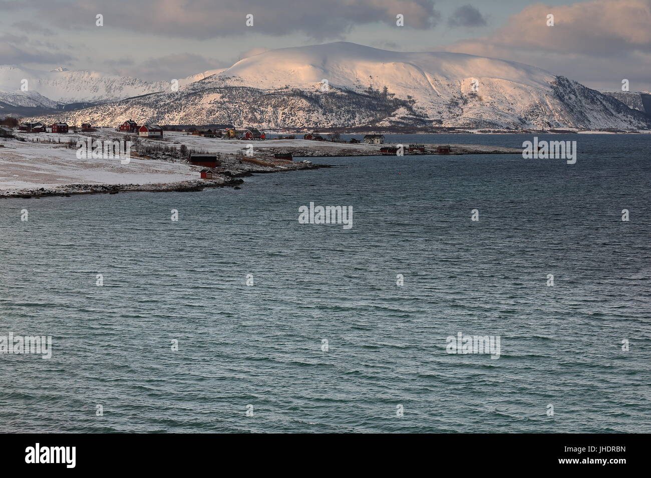 Houses on Holdoya-island E.shore seen from Ringen hamlet on Austvagoya ...