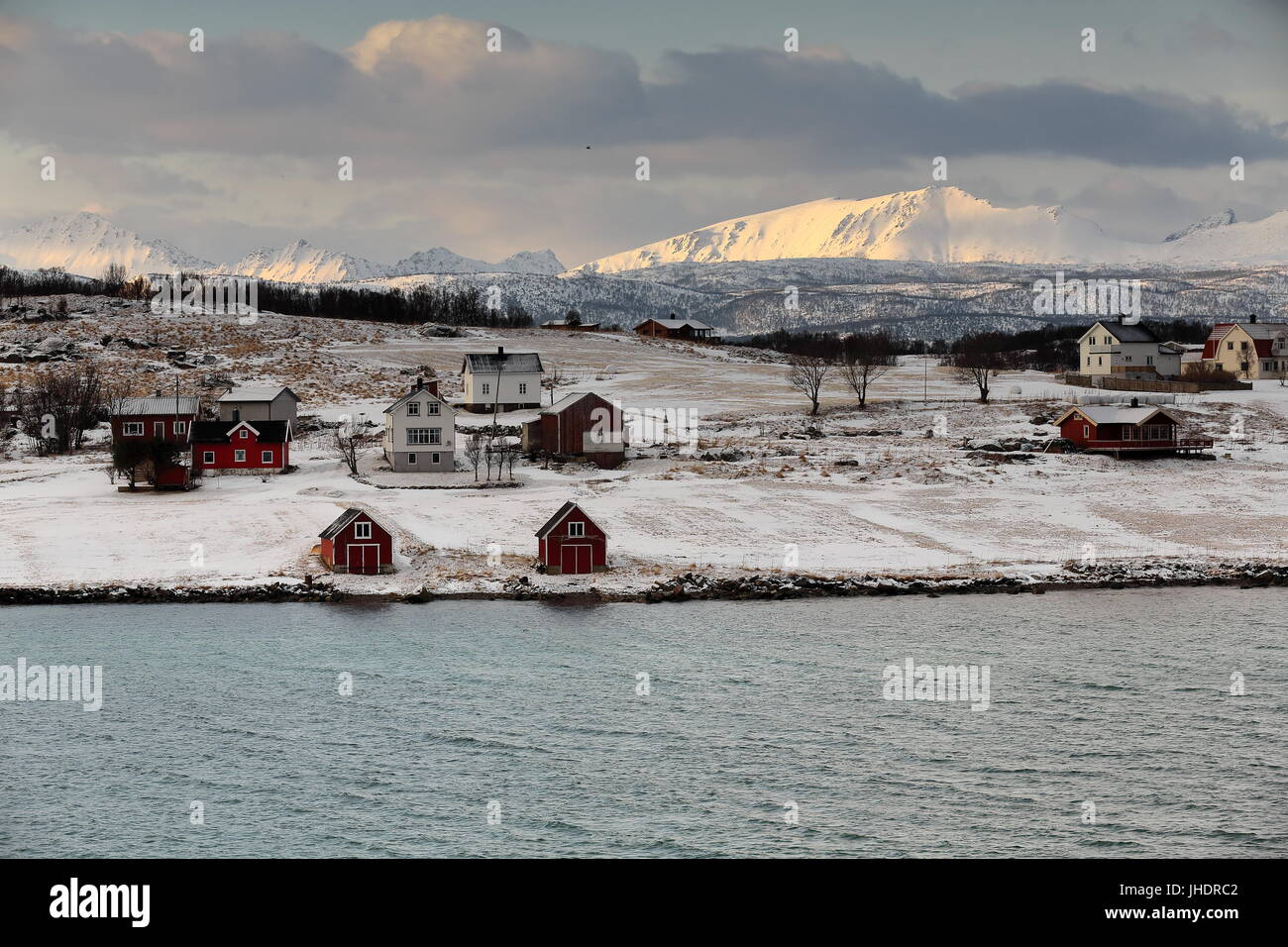 Houses on Holdoya-island E.shore seen from Ringen hamlet on Austvagoya ...