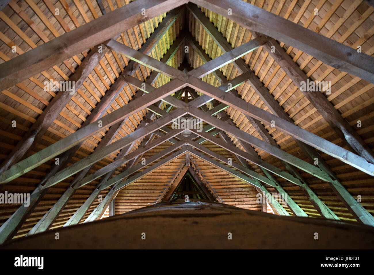 Internal view of a roof of a wooden church made of wooden shingles ...