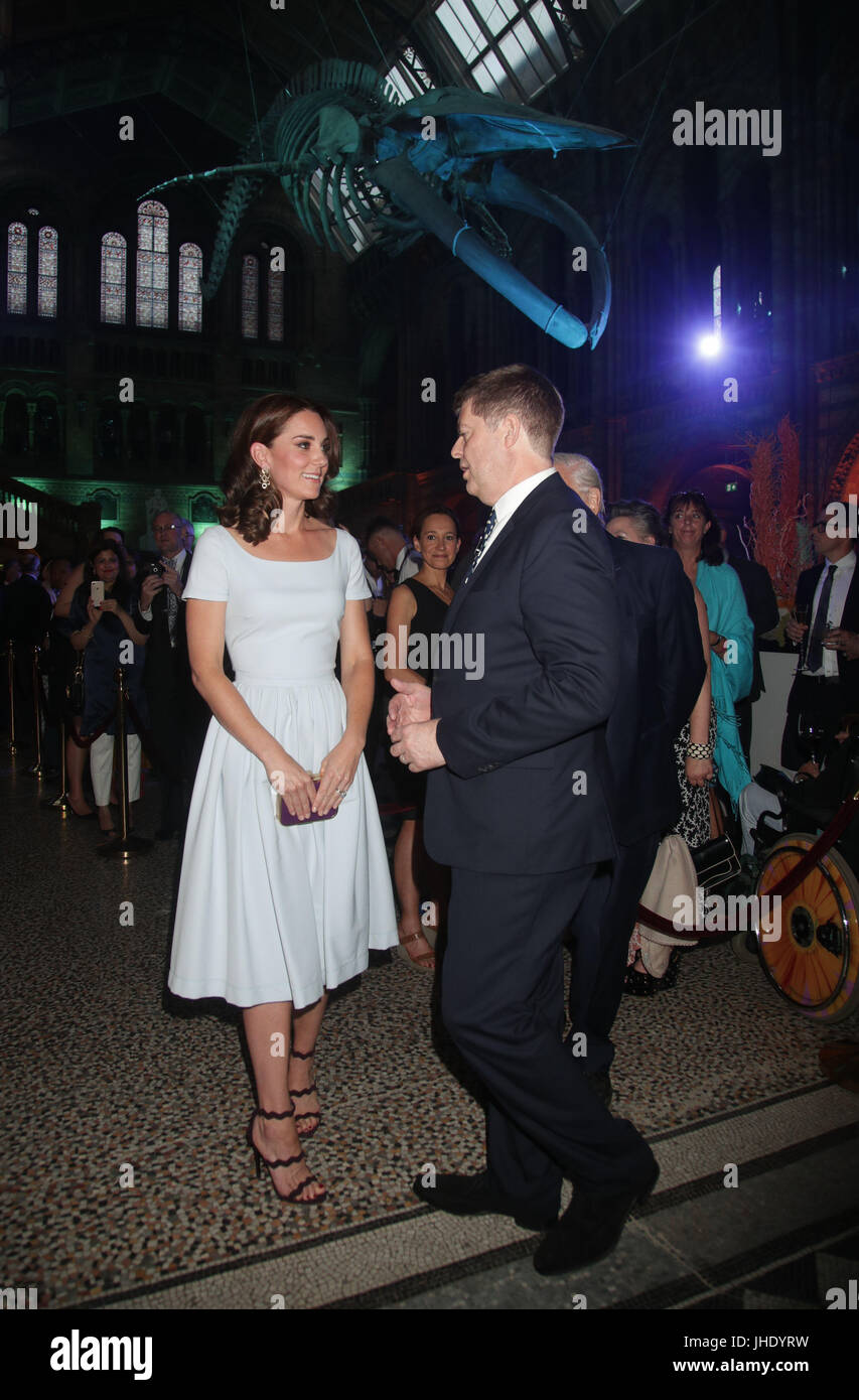 The Duchess of Cambridge talks to museum director Sir Michael Dixon as ...