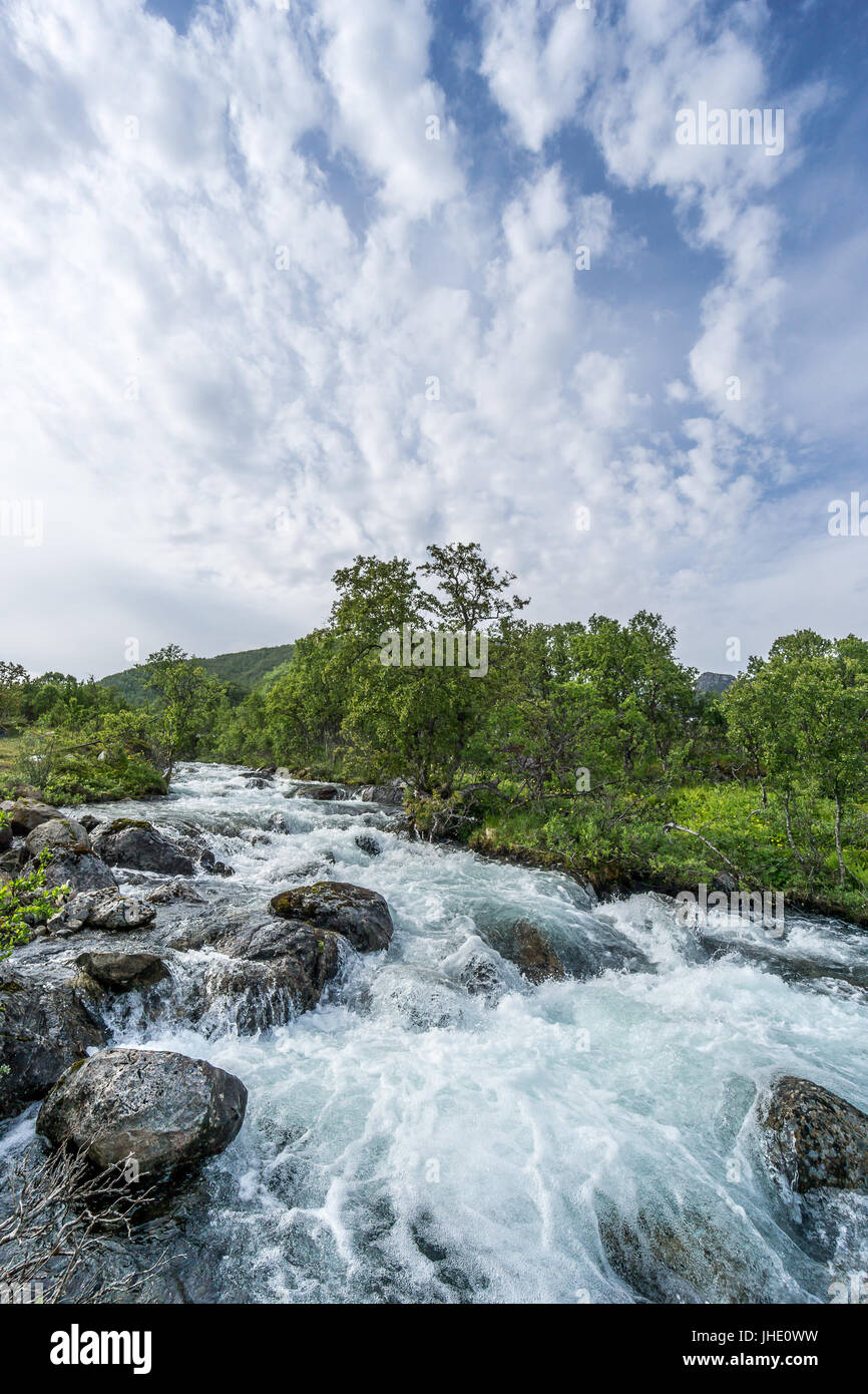 Fresh spring water running down towards the ocean Stock Photo - Alamy