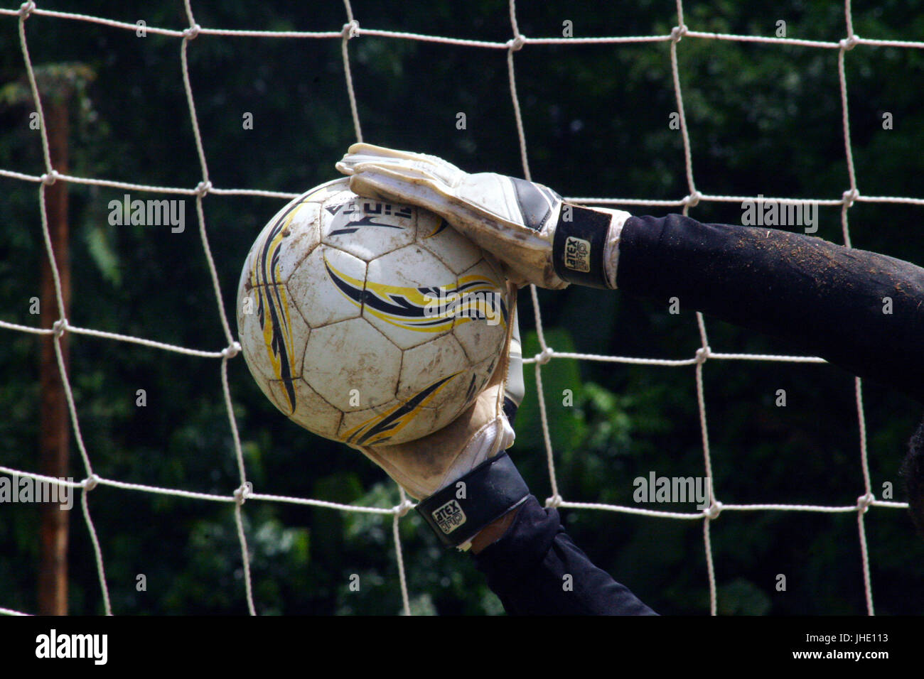Soccer Ball In Net With Goalie