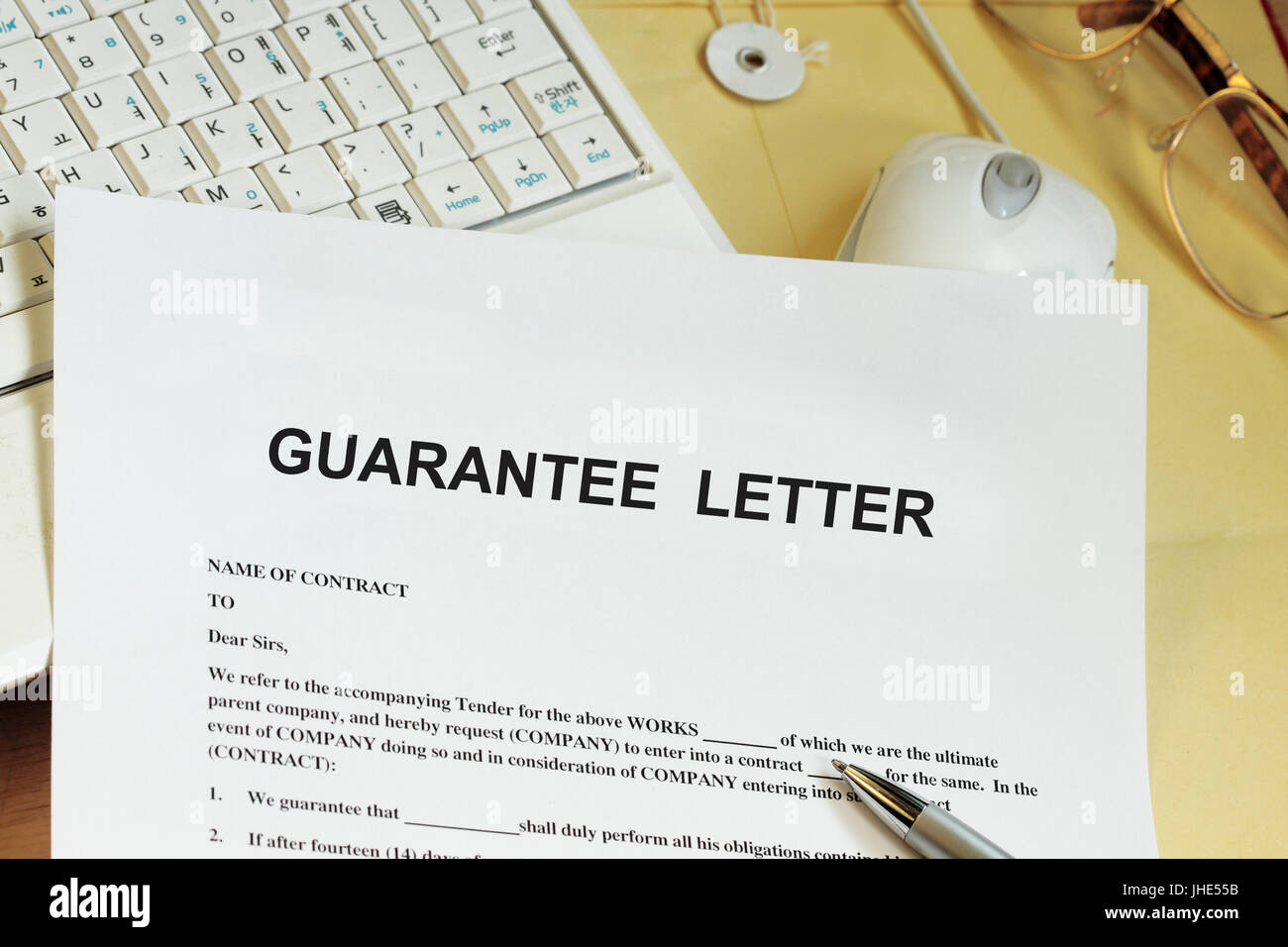 Guarantee letter and close-up of the contract document and pen Stock ...