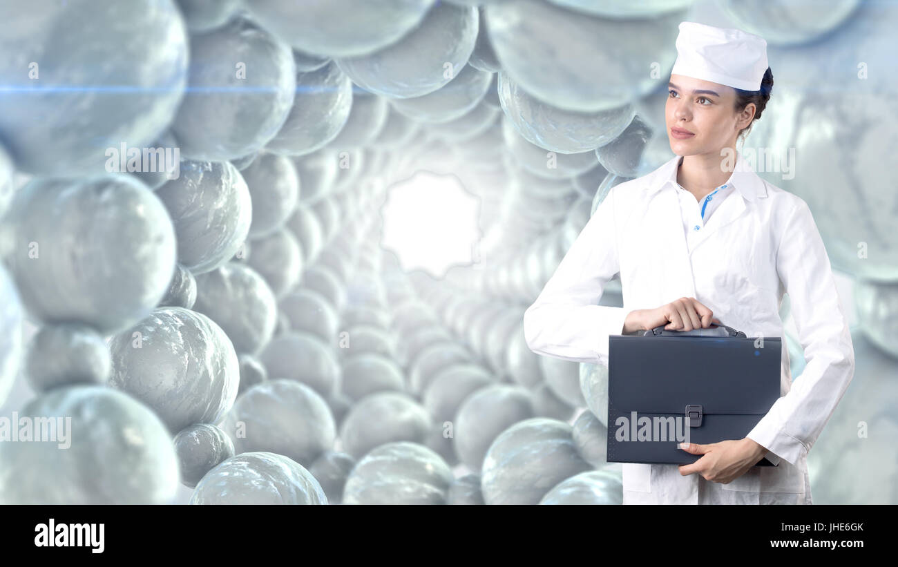 Beautiful medical woman doctor in uniform. Studio painted background ...